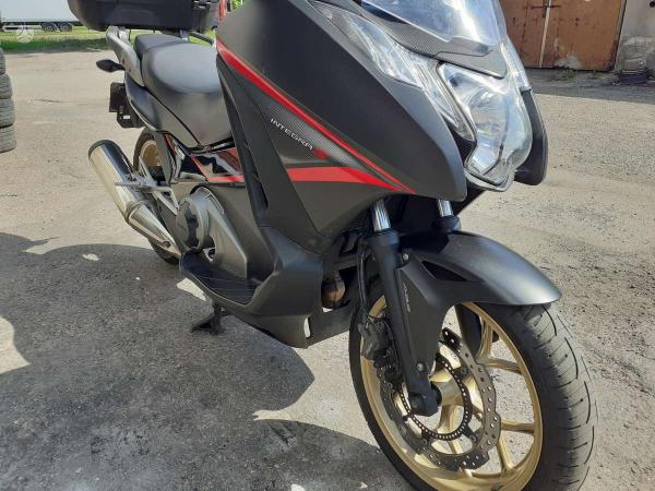 Black Honda NC 2014 in Panevezys, with an engine capacity of 0.75 L and mileage of 50 thousand km for 3750 €, photo 6 on AUTOMOTO.COM.LV