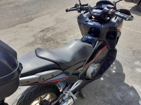Black Honda NC 2014 in Panevezys, with an engine capacity of 0.75 L and mileage of 50 thousand km for 3750 €, photo 10 on AUTOMOTO.COM.LV