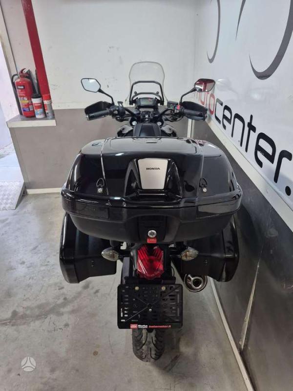 Black Honda NC 2015 in Kaunas, with an engine capacity of 0.75 L and mileage of 85 thousand km for 5000 €, photo 11 on AUTOMOTO.COM.LV