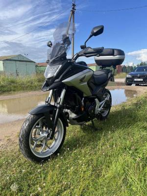 Black Honda NC 2016 in Klaipeda, with an engine capacity of 0.75 L and mileage of 21 thousand km for 4500 €, photo  on AUTOMOTO.COM.LV