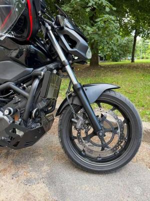 Black Honda NC 2016 in Vilnius, with an engine capacity of 0.75 L and mileage of 52 thousand km for 3199 €, photo 5 on AUTOMOTO.COM.LV