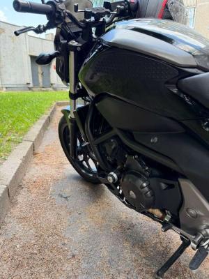 Black Honda NC 2016 in Vilnius, with an engine capacity of 0.75 L and mileage of 52 thousand km for 3199 €, photo 6 on AUTOMOTO.COM.LV