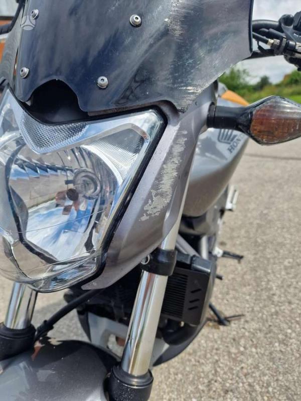 Grey Honda NC 2012 in Sakiai, with an engine capacity of 0.70 L and mileage of 55 thousand km for 2600 €, photo 3 on AUTOMOTO.COM.LV
