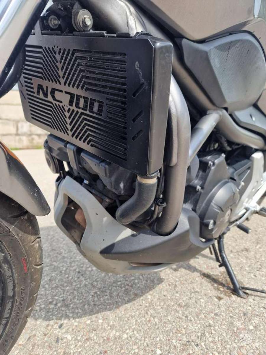 Grey Honda NC 2012 in Sakiai, with an engine capacity of 0.70 L and mileage of 55 thousand km for 2600 €, photo 12 on AUTOMOTO.COM.LV