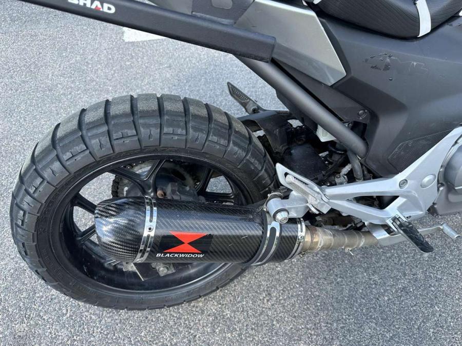Grey Honda NC 2013 in Vilnius, with an engine capacity of 0.67 L and mileage of 32 thousand km for 3596 €, photo 4 on AUTOMOTO.COM.LV