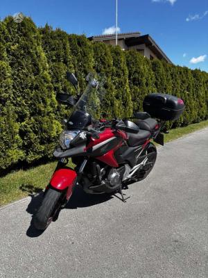 Red Honda NC 2012 in Klaipeda, with an engine capacity of 0.67 L and mileage of 61 thousand km for 3500 €, photo  on AUTOMOTO.COM.LV