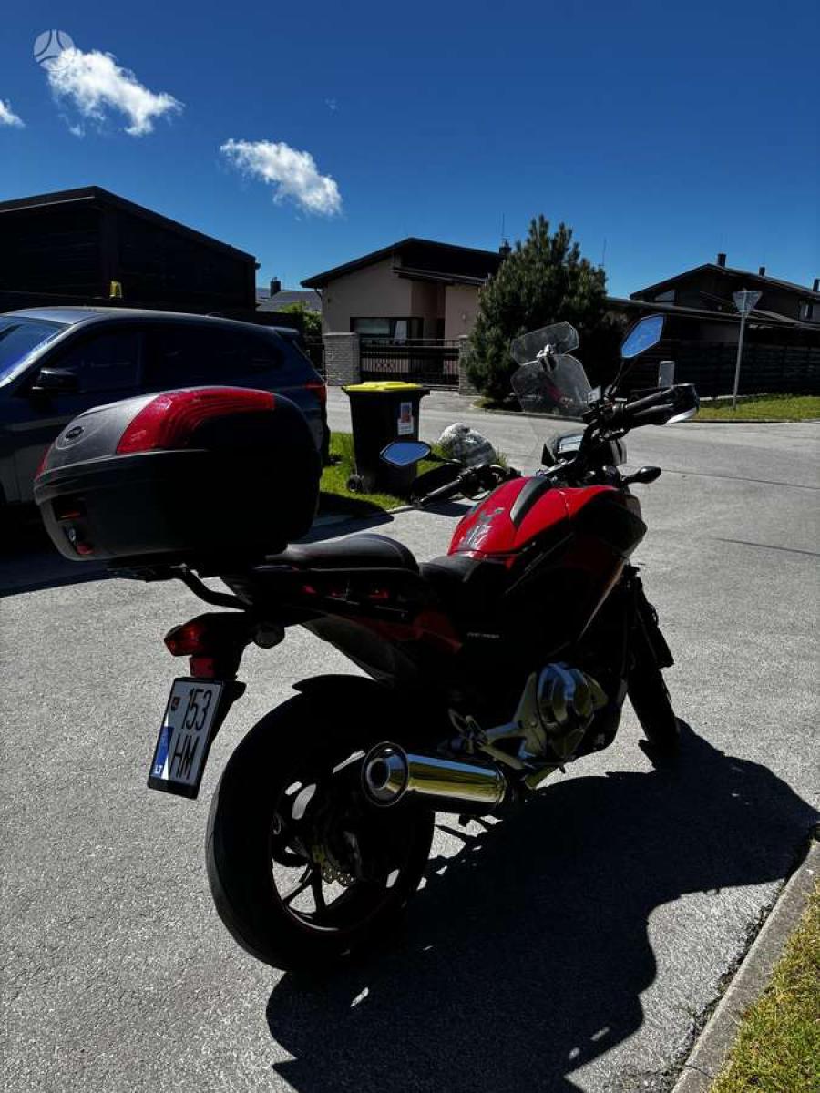 Red Honda NC 2012 in Klaipeda, with an engine capacity of 0.67 L and mileage of 61 thousand km for 3500 €, photo 4 on AUTOMOTO.COM.LV