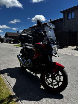 Red Honda NC 2012 in Klaipeda, with an engine capacity of 0.67 L and mileage of 61 thousand km for 3500 €, photo 5 on AUTOMOTO.COM.LV