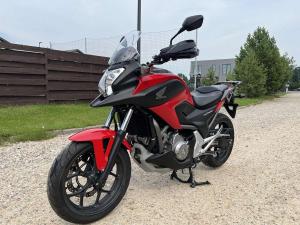 Red Honda NC 2012 in Vilnius, with an engine capacity of 0.70 L and mileage of 14 thousand km for 3900 €, photo  on AUTOMOTO.COM.LV