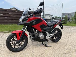Red Honda NC 2012 in Vilnius, with an engine capacity of 0.70 L and mileage of 14 thousand km for 3900 €, photo 3 on AUTOMOTO.COM.LV
