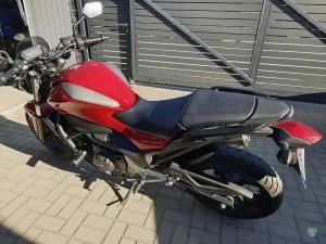 Red Honda NC 2014 in Kaunas, with an engine capacity of 0.75 L and mileage of 23 thousand km for 3449 €, photo 3 on AUTOMOTO.COM.LV