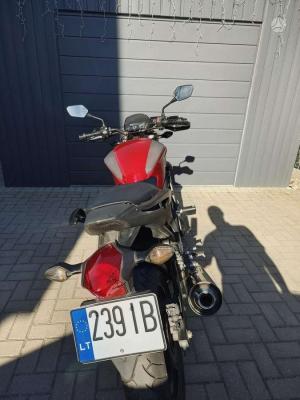 Red Honda NC 2014 in Kaunas, with an engine capacity of 0.75 L and mileage of 23 thousand km for 3449 €, photo 8 on AUTOMOTO.COM.LV