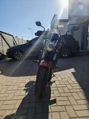 Red Honda NC 2014 in Kaunas, with an engine capacity of 0.75 L and mileage of 23 thousand km for 3449 €, photo 10 on AUTOMOTO.COM.LV