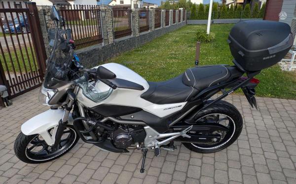 White Honda NC 2012 in Siauliai, with an engine capacity of 0.67 L and mileage of 37 thousand km for 3950 €, photo 3 on AUTOMOTO.COM.LV