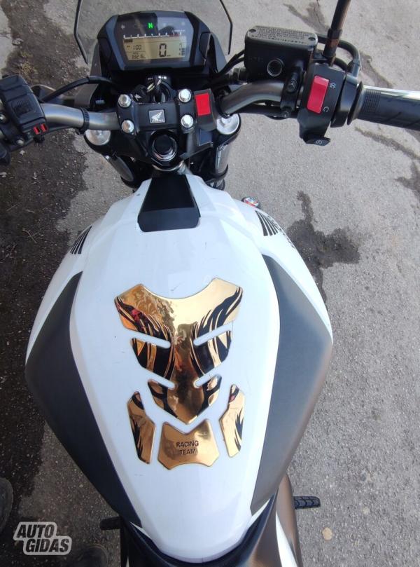 White Honda NC 2013 in Panevezys, with an engine capacity of 0.70 L and mileage of 32 thousand km for 3100 €, photo 7 on AUTOMOTO.COM.LV