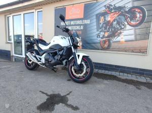 White Honda NC 2013 in Panevezys, with an engine capacity of 0.70 L and mileage of 32 thousand km for 2950 €, photo  on AUTOMOTO.COM.LV