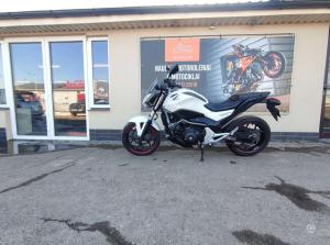 White Honda NC 2013 in Panevezys, with an engine capacity of 0.70 L and mileage of 32 thousand km for 2950 €, photo 7 on AUTOMOTO.COM.LV