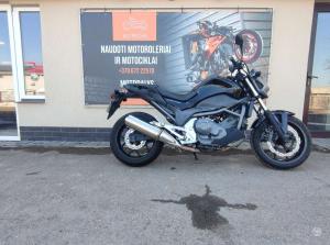 White Honda NC 2013 in Panevezys, with an engine capacity of 0.70 L and mileage of 32 thousand km for 2950 €, photo 14 on AUTOMOTO.COM.LV
