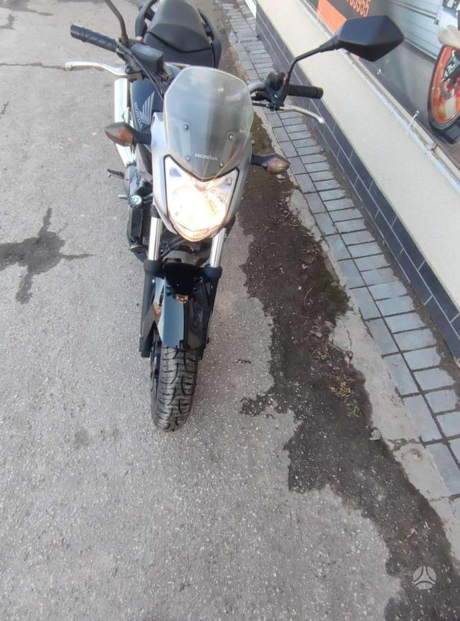 White Honda NC 2013 in Panevezys, with an engine capacity of 0.70 L and mileage of 32 thousand km for 2950 €, photo 15 on AUTOMOTO.COM.LV