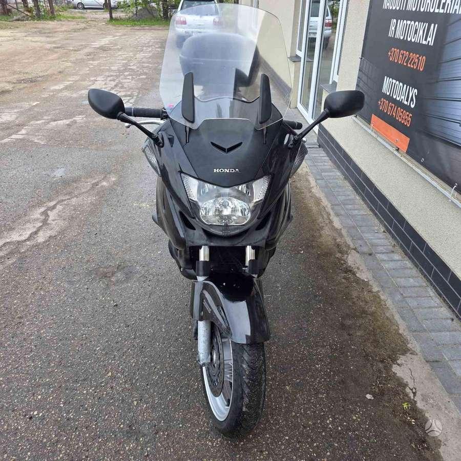 Melns Honda NT 2006 Panevēža, ar dzinēja tilpumu 0.70 L un nobraukumu 85 tūkst. km par 2750 €, foto 6 vietnē AUTOMOTO.COM.LV