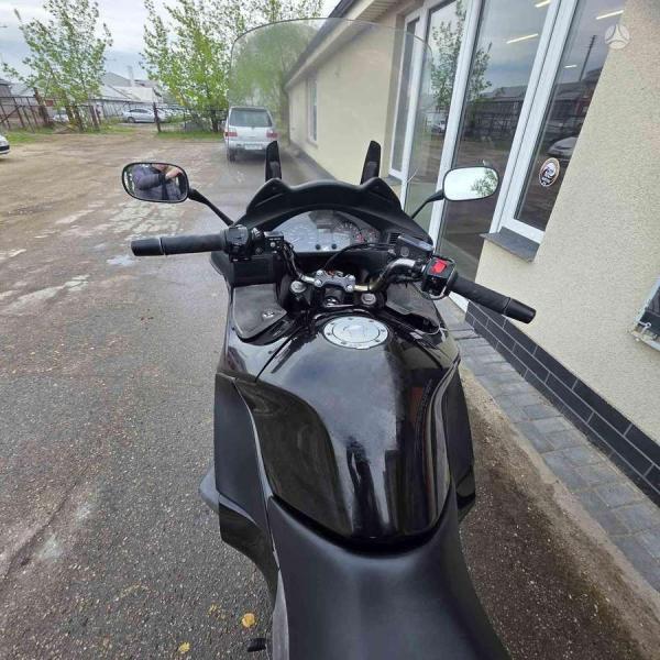 Melns Honda NT 2006 Panevēža, ar dzinēja tilpumu 0.70 L un nobraukumu 85 tūkst. km par 2750 €, foto 7 vietnē AUTOMOTO.COM.LV