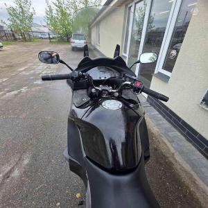 Melns Honda NT 2006 Panevēža, ar dzinēja tilpumu 0.70 L un nobraukumu 85 tūkst. km par 2750 €, foto 7 vietnē AUTOMOTO.COM.LV