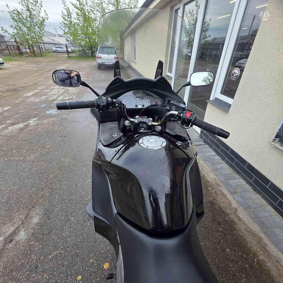 Melns Honda NT 2006 Panevēža, ar dzinēja tilpumu 0.70 L un nobraukumu 85 tūkst. km par 2750 €, foto 7 vietnē AUTOMOTO.COM.LV