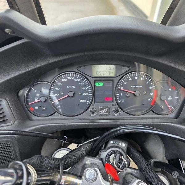 Melns Honda NT 2006 Panevēža, ar dzinēja tilpumu 0.70 L un nobraukumu 85 tūkst. km par 2750 €, foto 8 vietnē AUTOMOTO.COM.LV