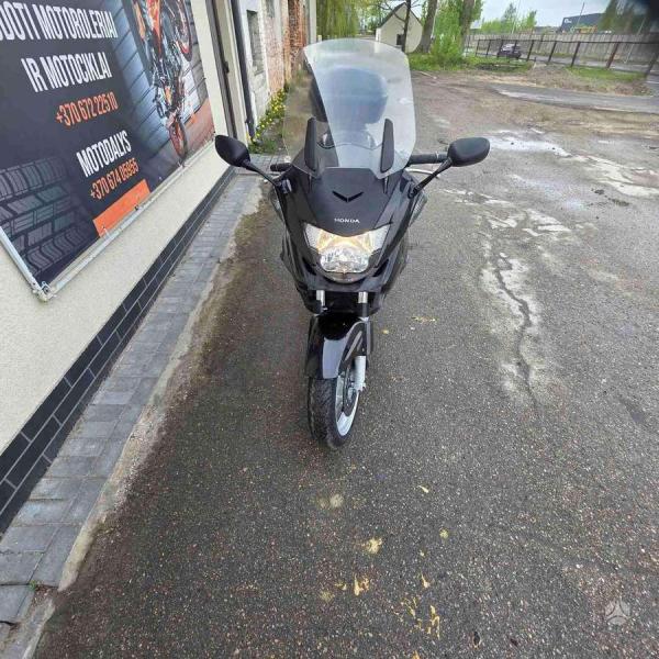 Melns Honda NT 2006 Panevēža, ar dzinēja tilpumu 0.70 L un nobraukumu 85 tūkst. km par 2750 €, foto 9 vietnē AUTOMOTO.COM.LV
