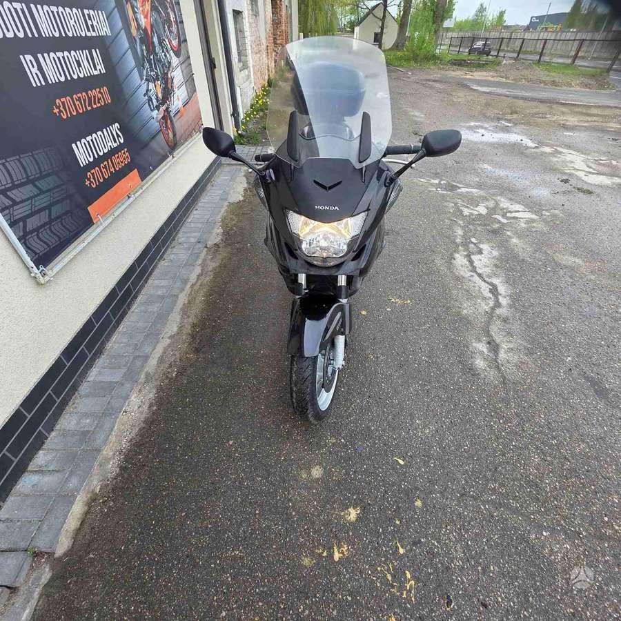 Melns Honda NT 2006 Panevēža, ar dzinēja tilpumu 0.70 L un nobraukumu 85 tūkst. km par 2750 €, foto 9 vietnē AUTOMOTO.COM.LV
