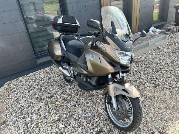 Brown Honda NT 2008 in Vilnius, with an engine capacity of 0.68 L and mileage of 67 thousand km for 2950 €, photo 3 on AUTOMOTO.COM.LV
