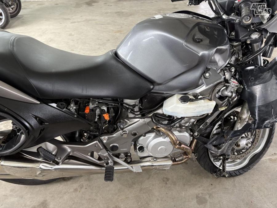 Honda NT 2006 in Kelme, with an engine capacity of 0.70 L and mileage of 42 thousand km for 565 €, photo 14 on AUTOMOTO.COM.LV
