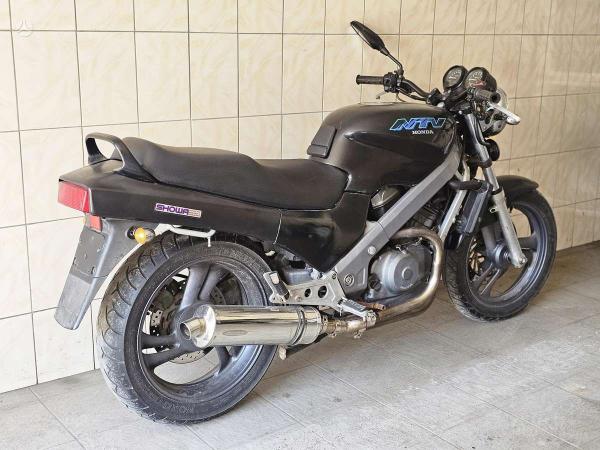 Melns Honda NTV 1994 Viļņa, ar dzinēja tilpumu 0.65 L un nobraukumu 91 tūkst. km par 730 €, foto 5 vietnē AUTOMOTO.COM.LV