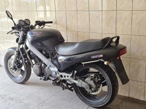 Melns Honda NTV 1994 Viļņa, ar dzinēja tilpumu 0.65 L un nobraukumu 91 tūkst. km par 730 €, foto 7 vietnē AUTOMOTO.COM.LV