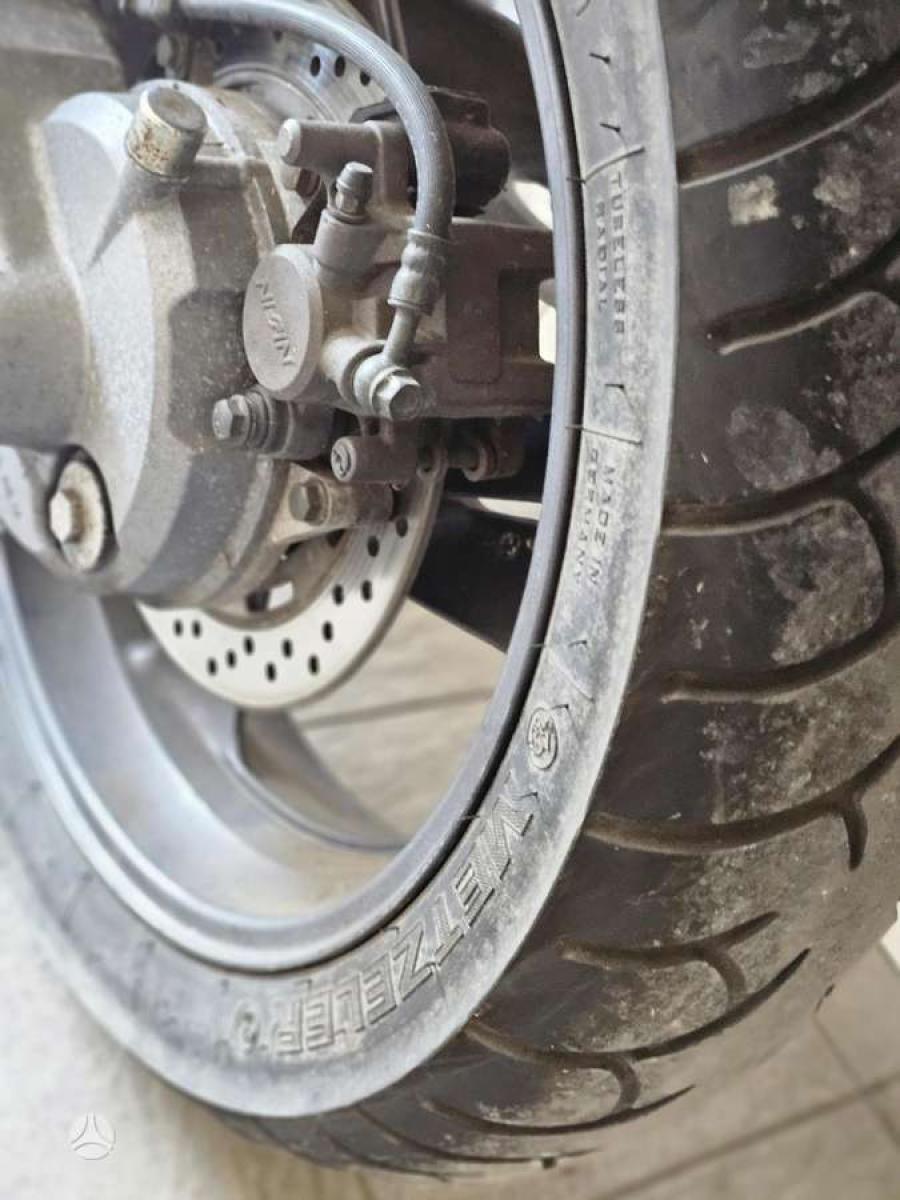 Melns Honda NTV 1994 Viļņa, ar dzinēja tilpumu 0.65 L un nobraukumu 91 tūkst. km par 730 €, foto 8 vietnē AUTOMOTO.COM.LV