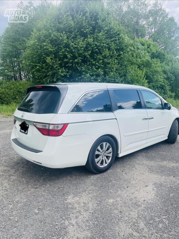 White Honda Odyssey 2014 in Alytus, with an engine capacity of 3.50 L and mileage of 246 thousand km for 11000 €, photo 5 on AUTOMOTO.COM.LV