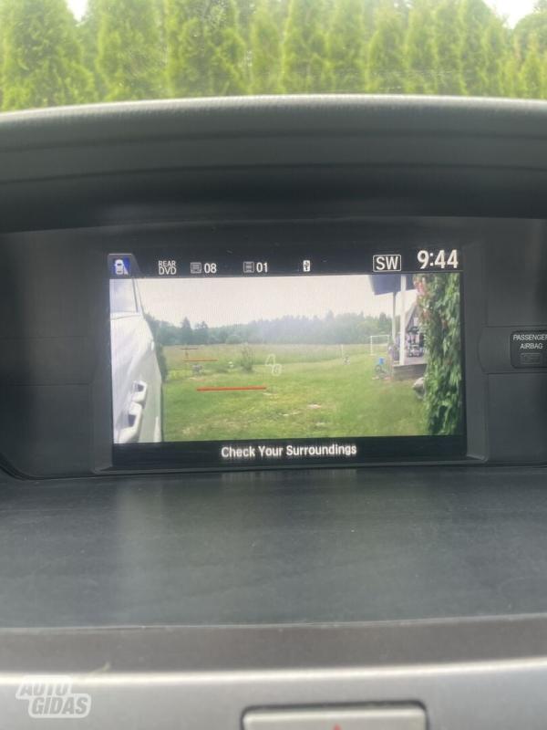 White Honda Odyssey 2014 in Alytus, with an engine capacity of 3.50 L and mileage of 246 thousand km for 11000 €, photo 9 on AUTOMOTO.COM.LV