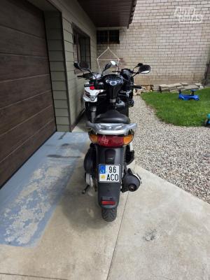 Black Honda SH 2008 in Pasvalys, with an engine capacity of 0.13 L and mileage of 25 thousand km for 999 €, photo 15 on AUTOMOTO.COM.LV
