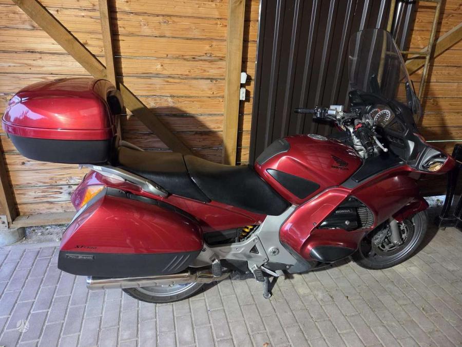 Red Honda ST 2008 in Jonava, with an engine capacity of 1.30 L and mileage of 63 thousand km for 4550 €, photo 5 on AUTOMOTO.COM.LV