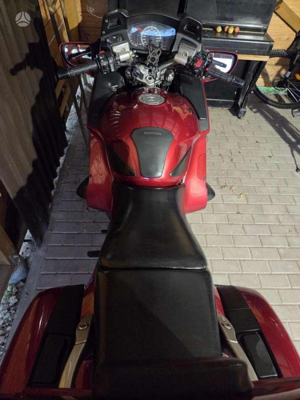 Red Honda ST 2008 in Jonava, with an engine capacity of 1.30 L and mileage of 63 thousand km for 4550 €, photo 7 on AUTOMOTO.COM.LV