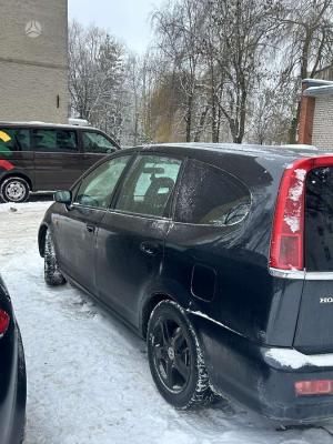 Black Honda Stream 2002 in Kaunas, with an engine capacity of 2.00 L and mileage of 302 thousand km for 499 €, photo 4 on AUTOMOTO.COM.LV
