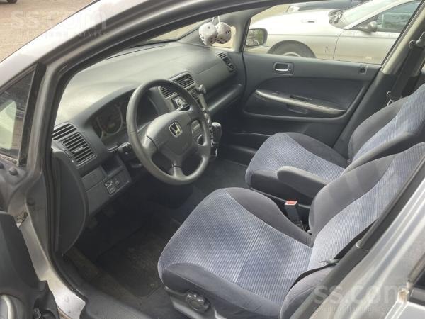 Grey Honda Stream 2001 in Riga, with an engine capacity of 2.00 L and mileage of 255 thousand km for 600 €, photo 6 on AUTOMOTO.COM.LV