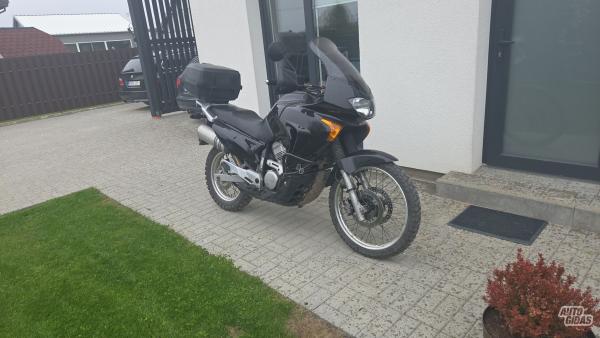 Black Honda Transalp 2002 in Klaipeda, with an engine capacity of 0.65 L and mileage of 76 thousand km for 2100 €, photo 1 on AUTOMOTO.COM.LV