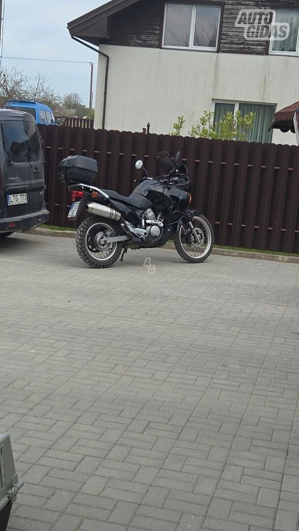 Black Honda Transalp 2002 in Klaipeda, with an engine capacity of 0.65 L and mileage of 76 thousand km for 2100 €, photo 2 on AUTOMOTO.COM.LV
