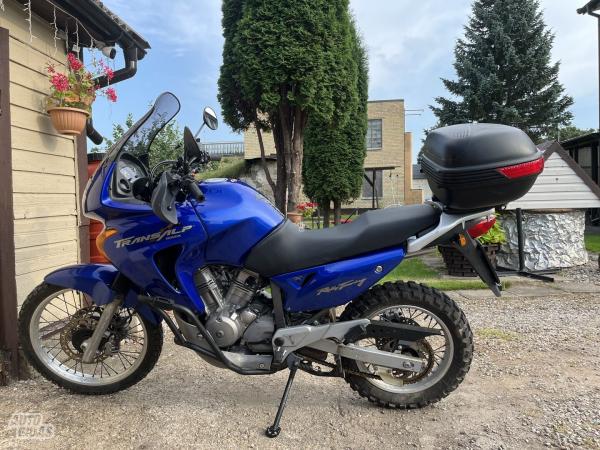 Синий Хонда Transalp 2001 в Утена, объемом двигателя 0.65 л и пробегом 63 тыс. км за 2400 €, фото 1 на AUTOMOTO.COM.LV