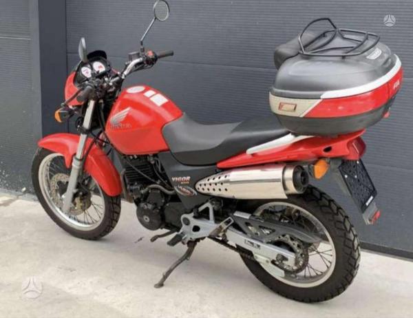 Sarkans Honda Vigor 2000 Viļņa, ar dzinēja tilpumu 0.65 L un nobraukumu 50 tūkst. km par 2000 €, foto 1 vietnē AUTOMOTO.COM.LV