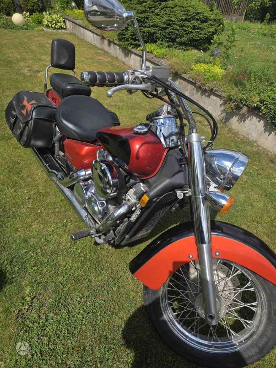 Orange Honda VT Shadow 2008 in Vilnius, with an engine capacity of 0.75 L and mileage of 12 thousand km for 4850 €, photo 1 on AUTOMOTO.COM.LV