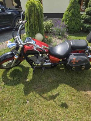 Orange Honda VT Shadow 2008 in Vilnius, with an engine capacity of 0.75 L and mileage of 12 thousand km for 4850 €, photo 6 on AUTOMOTO.COM.LV