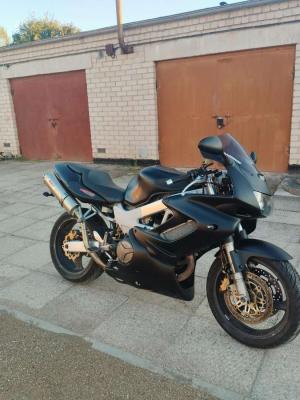Black Honda VTR 1000 1999 in Kaunas, with an engine capacity of 1.00 L and mileage of 37 thousand km for 1400 €, photo  on AUTOMOTO.COM.LV