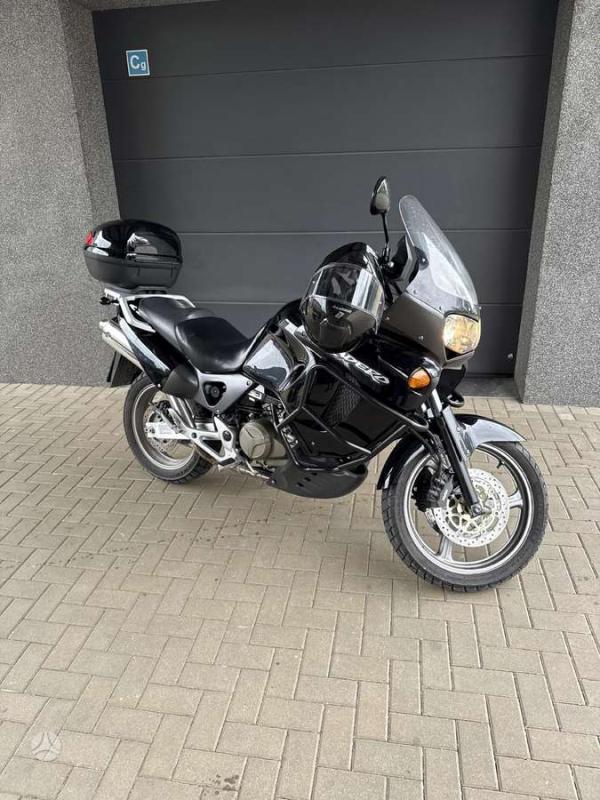 Melns Honda XL 2000 Kauņa, ar dzinēja tilpumu 1.00 L un nobraukumu 47 tūkst. km par 3100 €, foto 1 vietnē AUTOMOTO.COM.LV